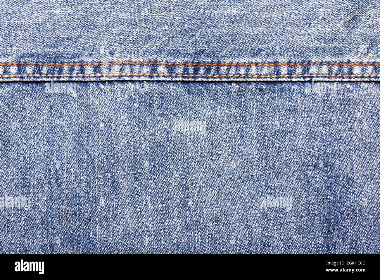 Texture backdrop photo of blue colored denim cloth with seam Stock ...