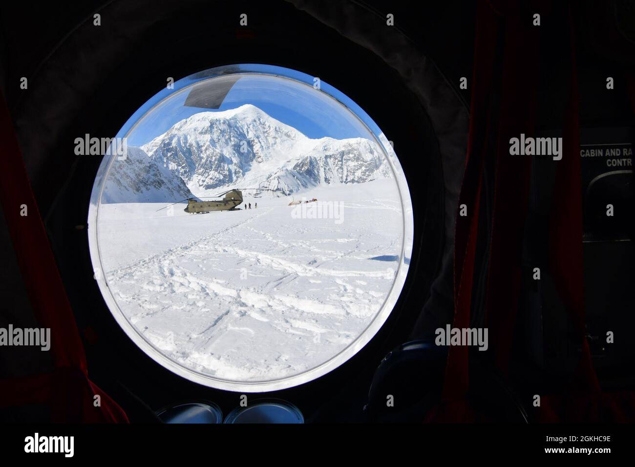 The bubble window of a CH-47F Chinook helicopter provides a circular ...