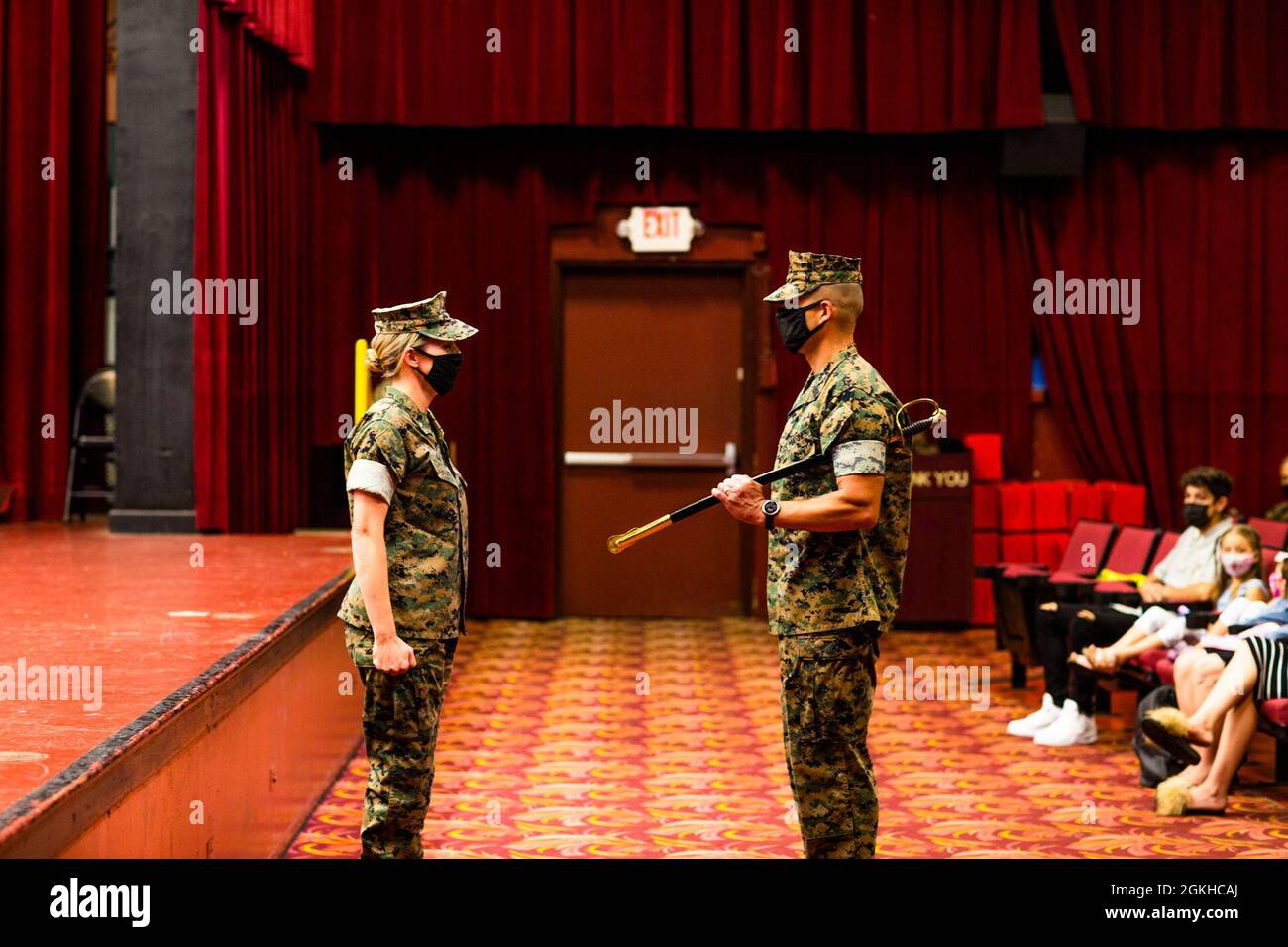 U.S. Marine Corps Sgt. Maj. Alfonso “YUT Juice-9” Ramos Jr., right ...