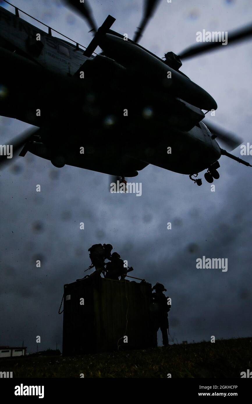 A U.S. Marine Corps CH-53 Super Stallion prepares to transport a ...