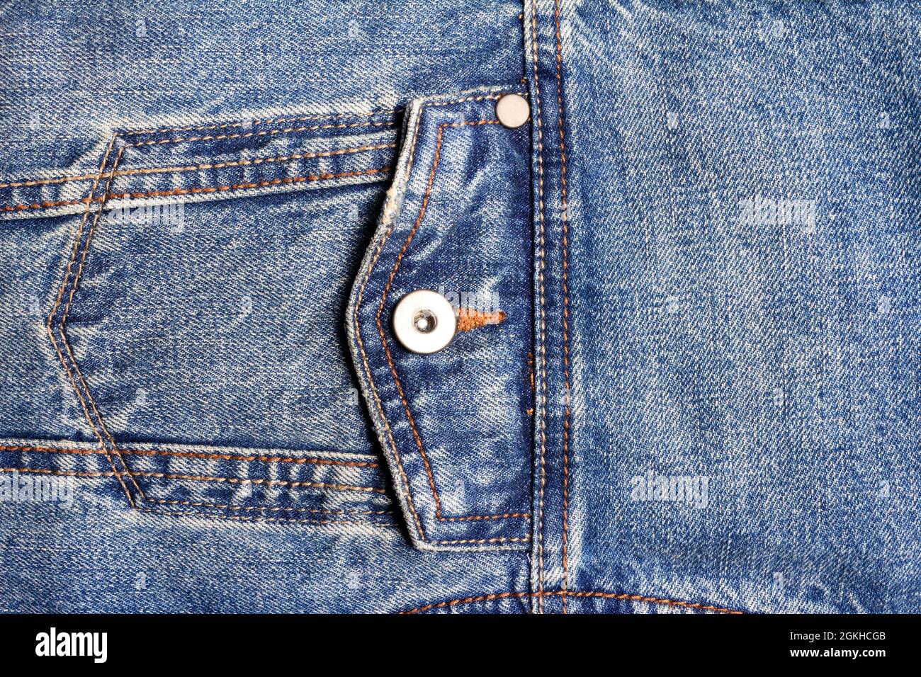 Texture backdrop photo of blue colored denim cloth with pocket and ...