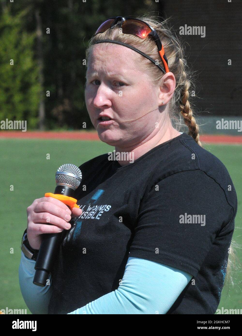 Former Staff Sgt. Elena Rooney speaks before students at the annual ...