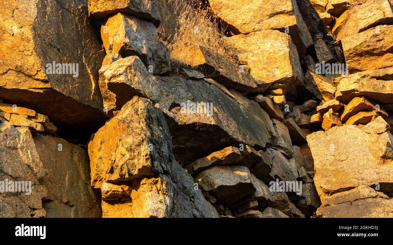 Texture backdrop photo of stone or rock wall on sunset lighting Stock ...