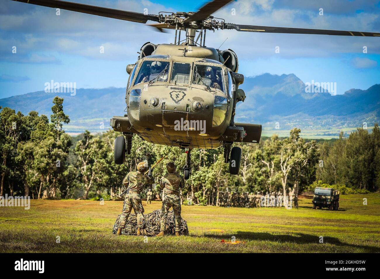 Schofield Barracks, HI — Soldiers rappel from a UH-60 Black Hawk during ...