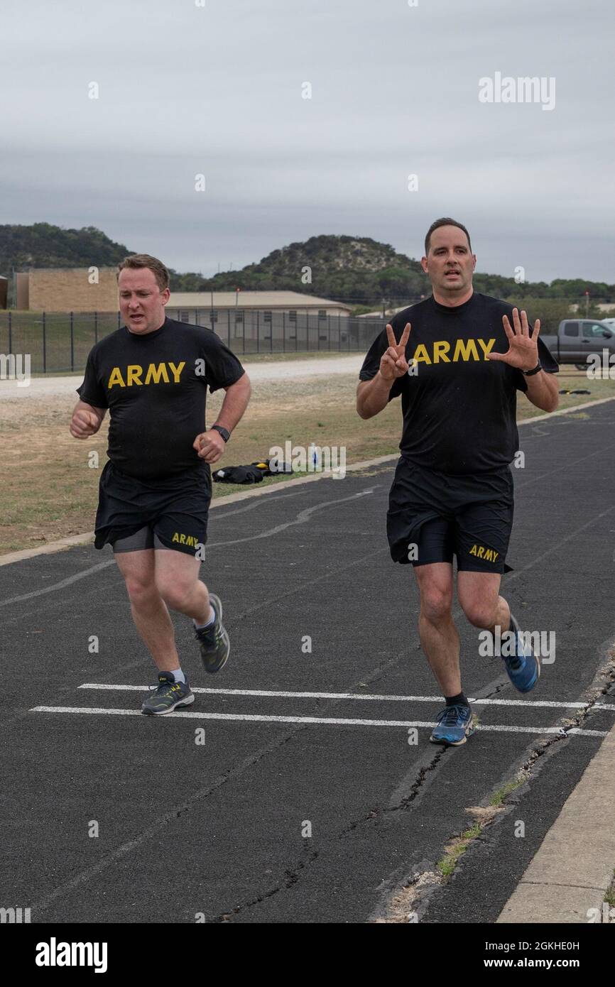 U.S. Army Soldiers run two-miles during the Army Combat Fitness Test ...