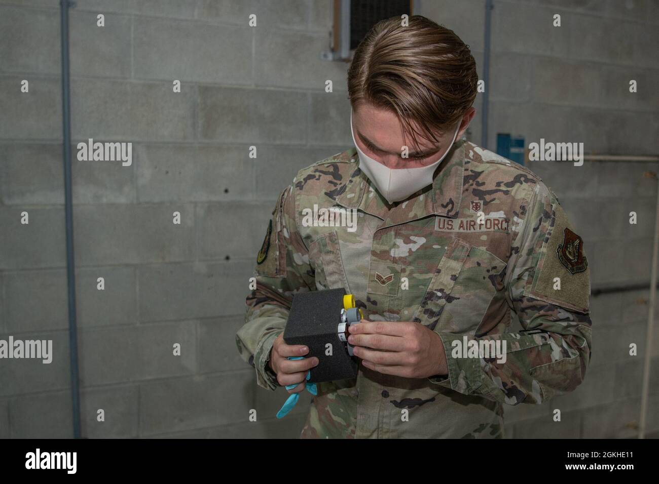 U.S. Air Force Senior Airman Samuel Dollen, an occupational health ...