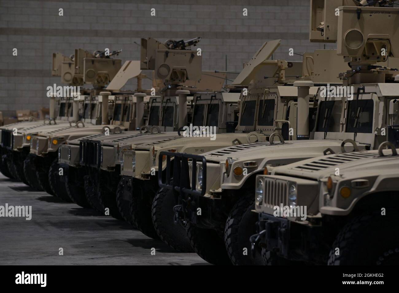 U.S. Army vehicles sit in formation in the McCormick Place in Chicago ...