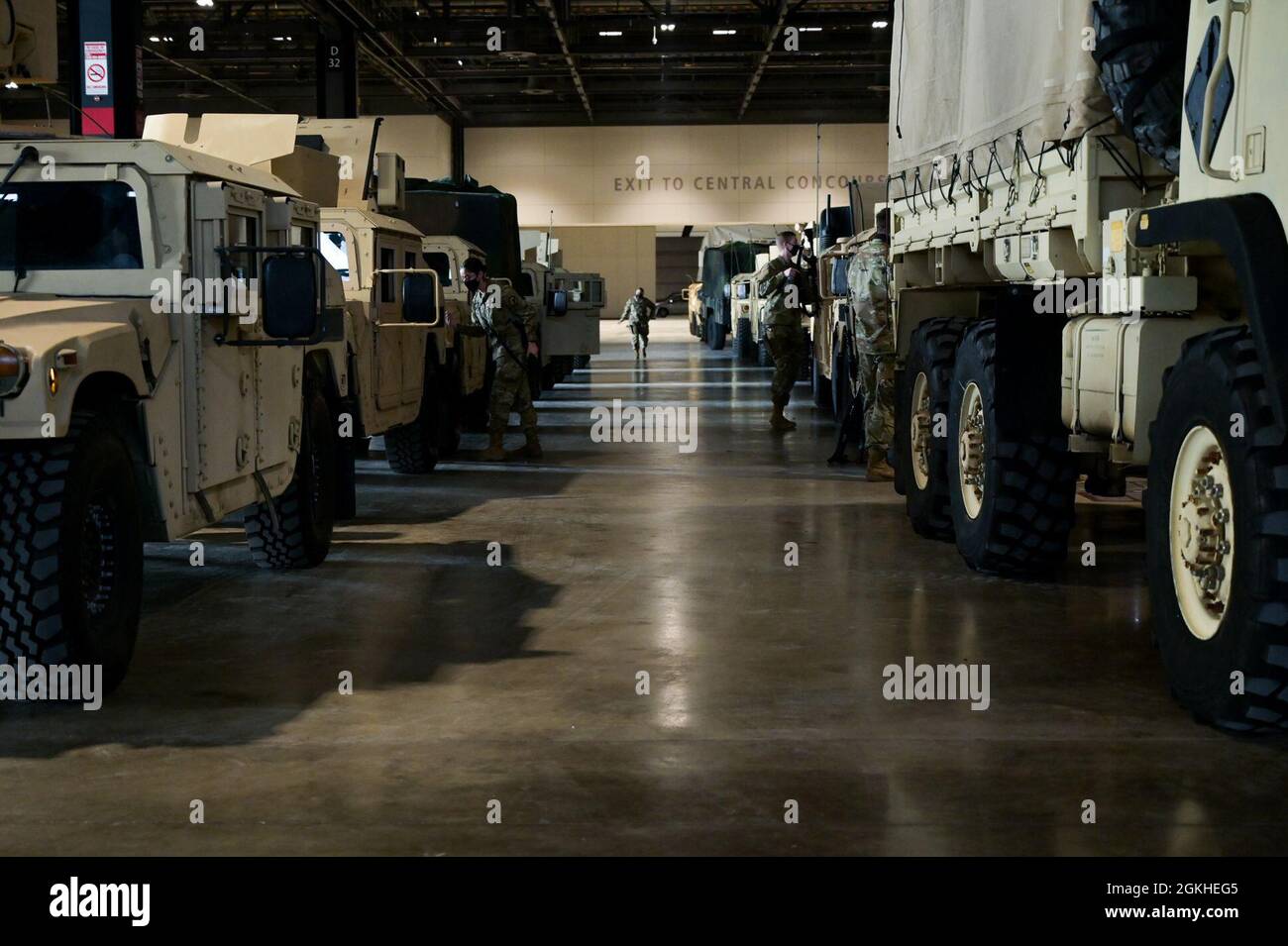 U.S. Army vehicles sit in formation in the McCormick Place in Chicago ...