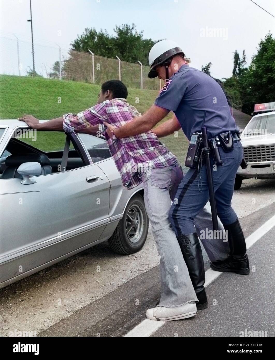 Policeman searching car hi-res stock photography and images - Alamy
