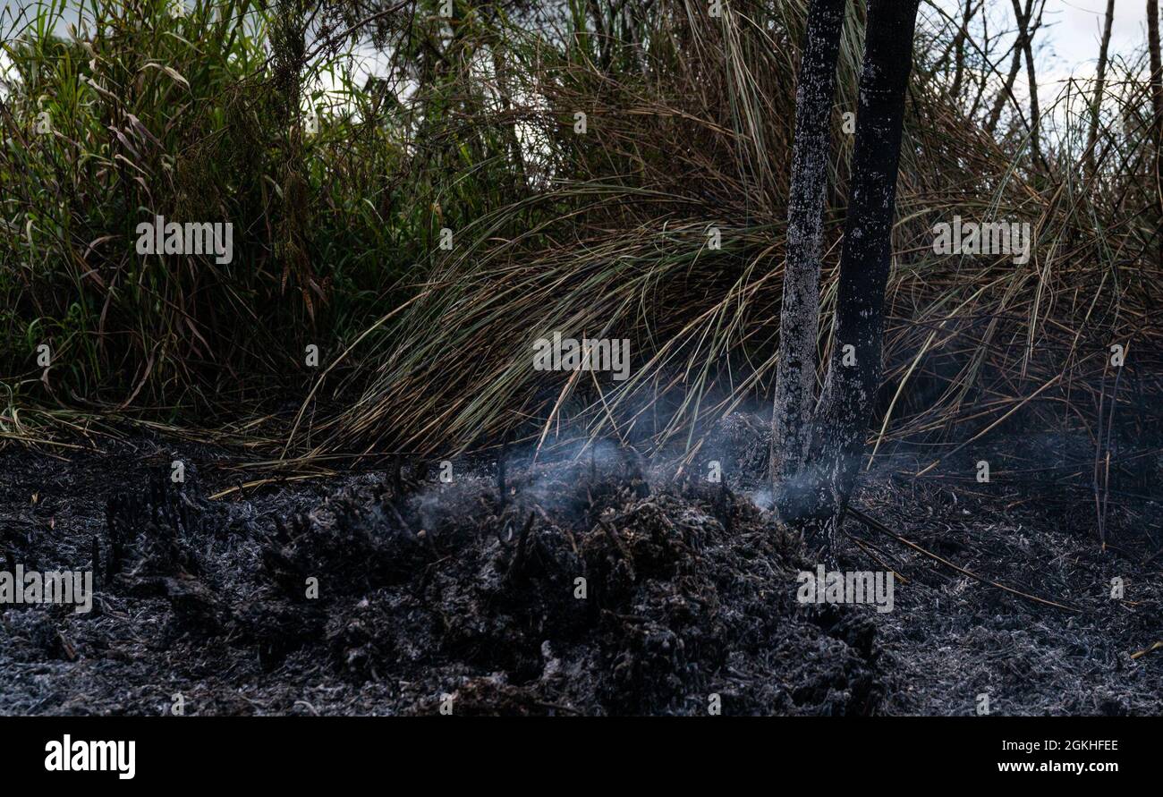 Leftover smoke is shown after a fire in Yigo, Guam, April 23, 2021. The ...