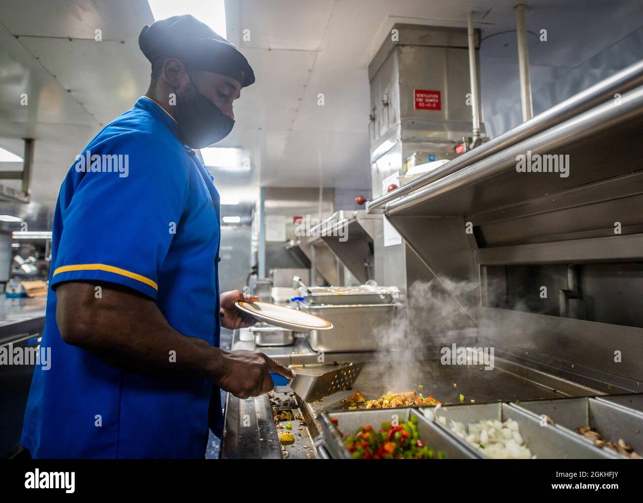 210423-N-DA693-1010 PACIFIC OCEAN (Apr. 23, 2021) Culinary Specialist ...