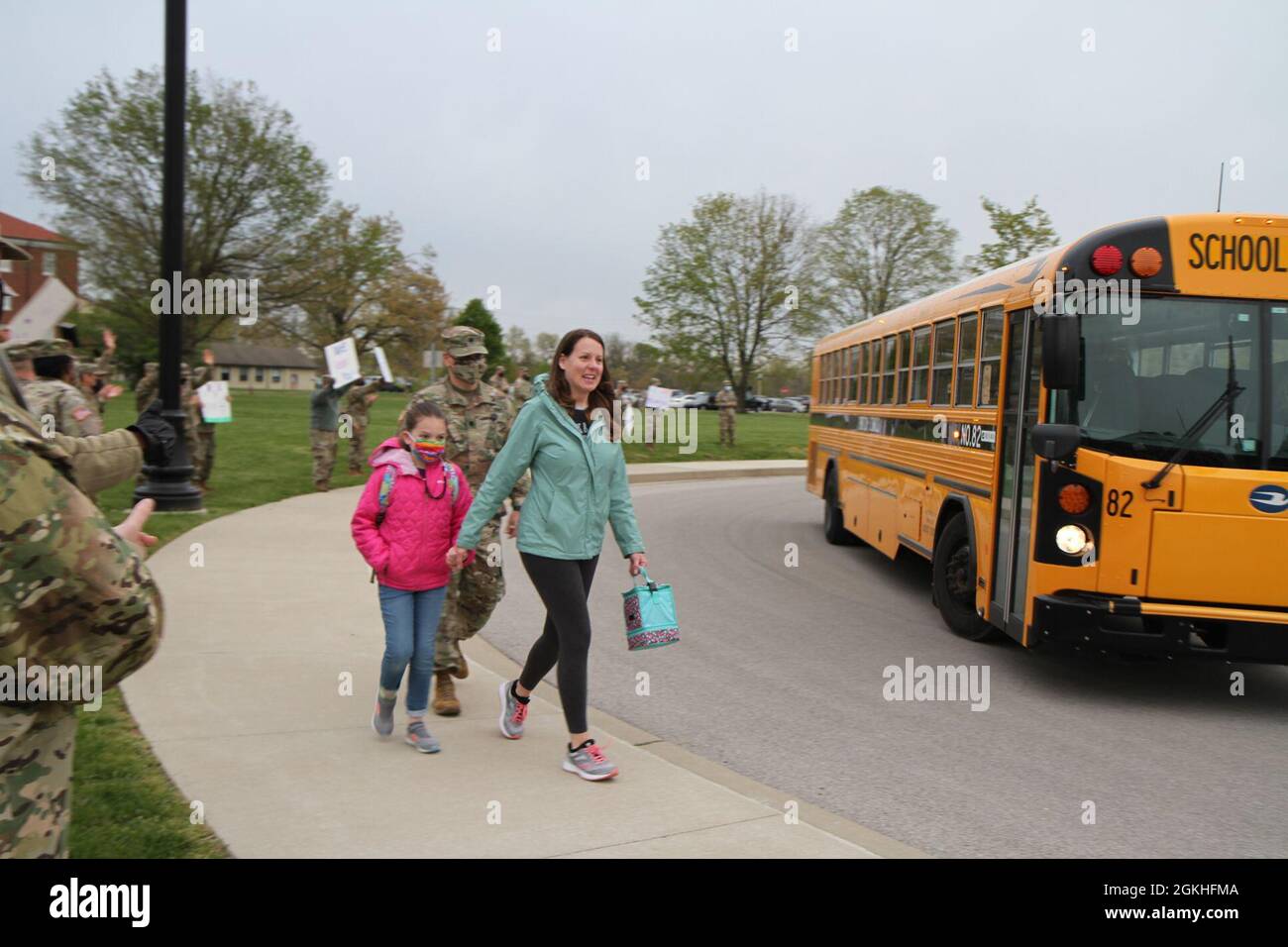 A military Family walking their child to Kingsolver Elementary School ...