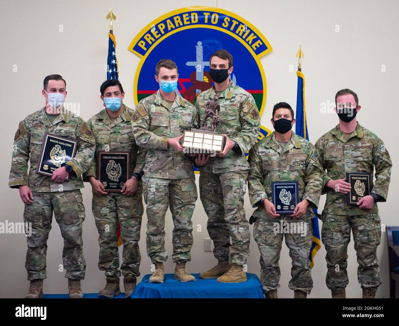 (Middle left) Airman 1st Class Robert Lowry and (middle right) 1st Lt ...