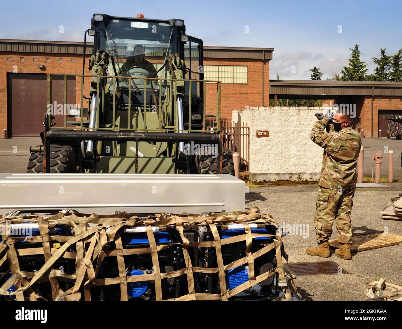U.S. Air Force Master Sgt. Leo Johnson, right, and Staff Sgt. Garett ...