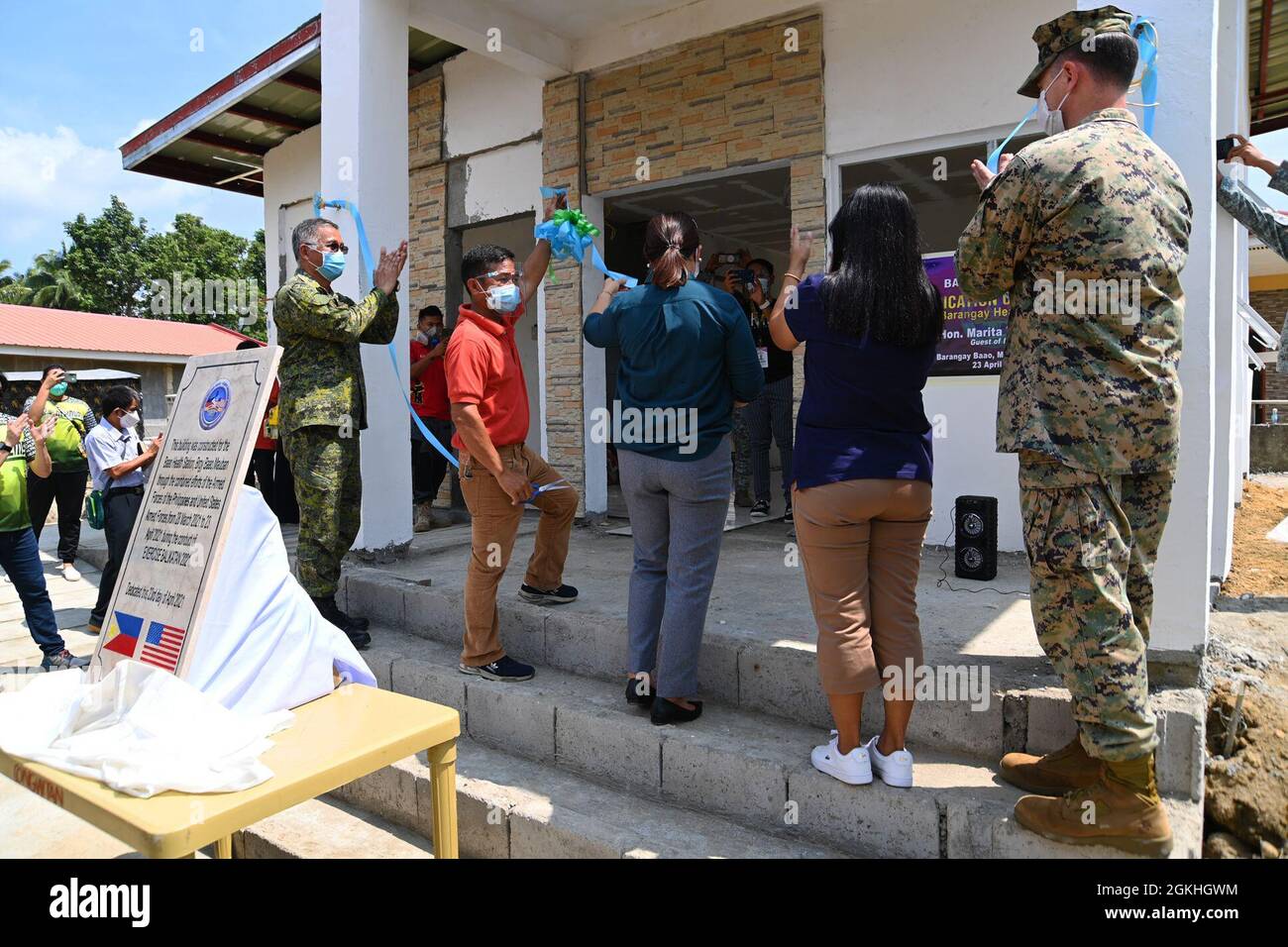 Balikatan leadership and Barangay Baao community leaders cut the ribbon ...