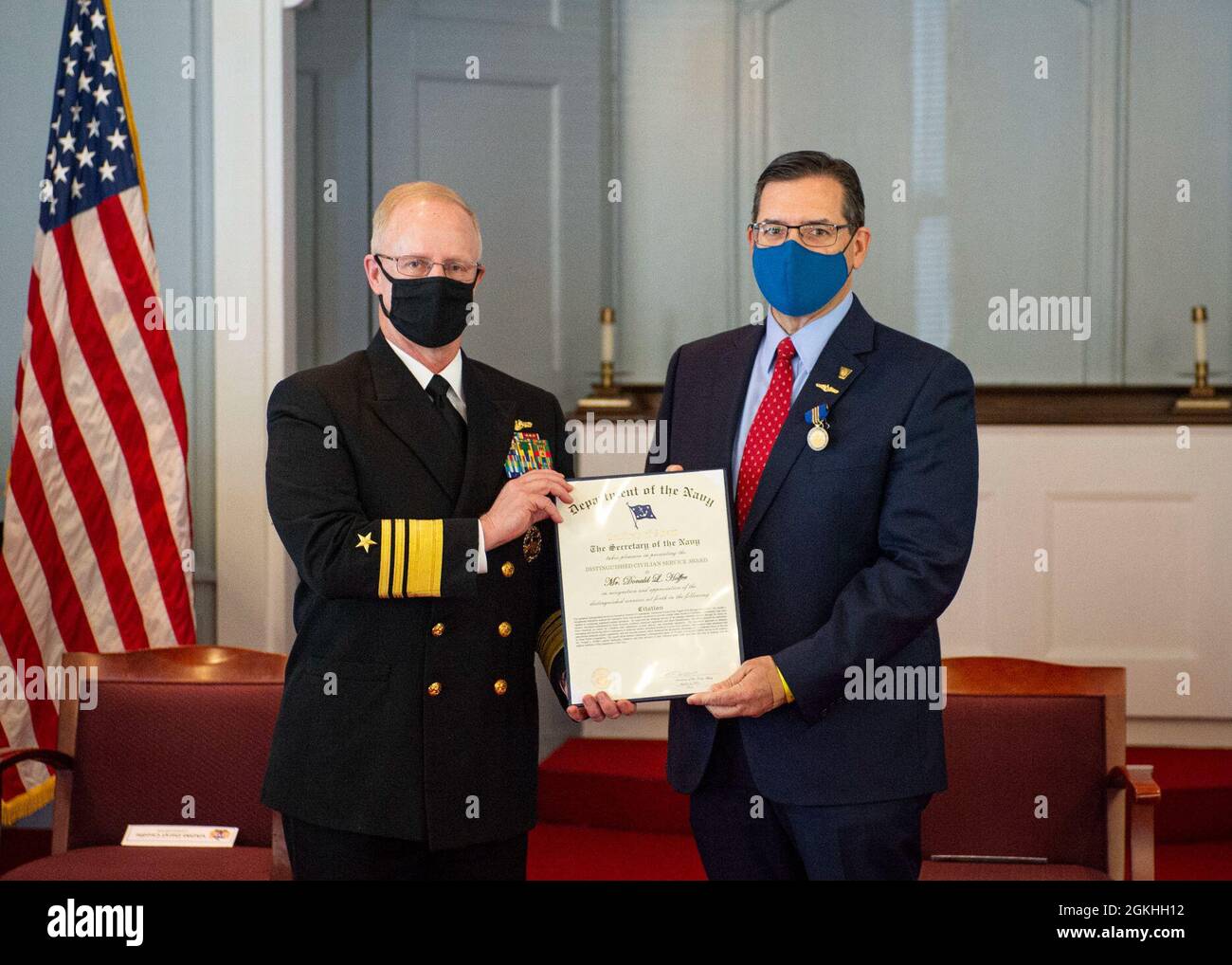 Vice Adm. Daryl Caudle, commander, Submarine Forces (SUBFOR), presents ...