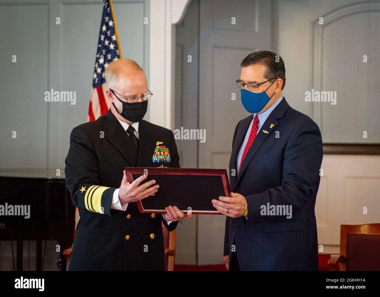Vice Adm. Daryl Caudle, commander, Submarine Forces (SUBFOR), presents ...
