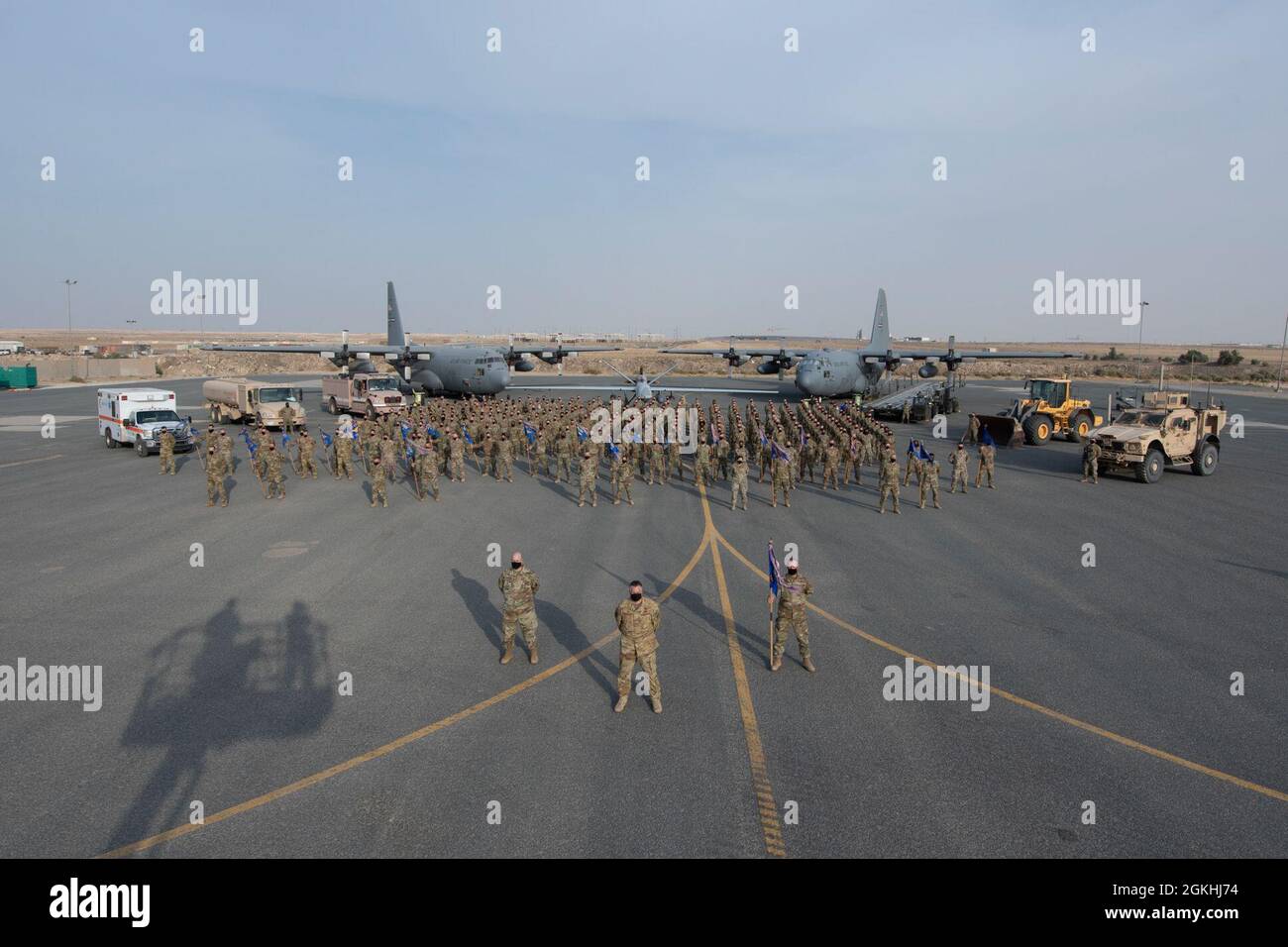 Members of the 386th Air Expeditionary Wing pose for a group photo ...