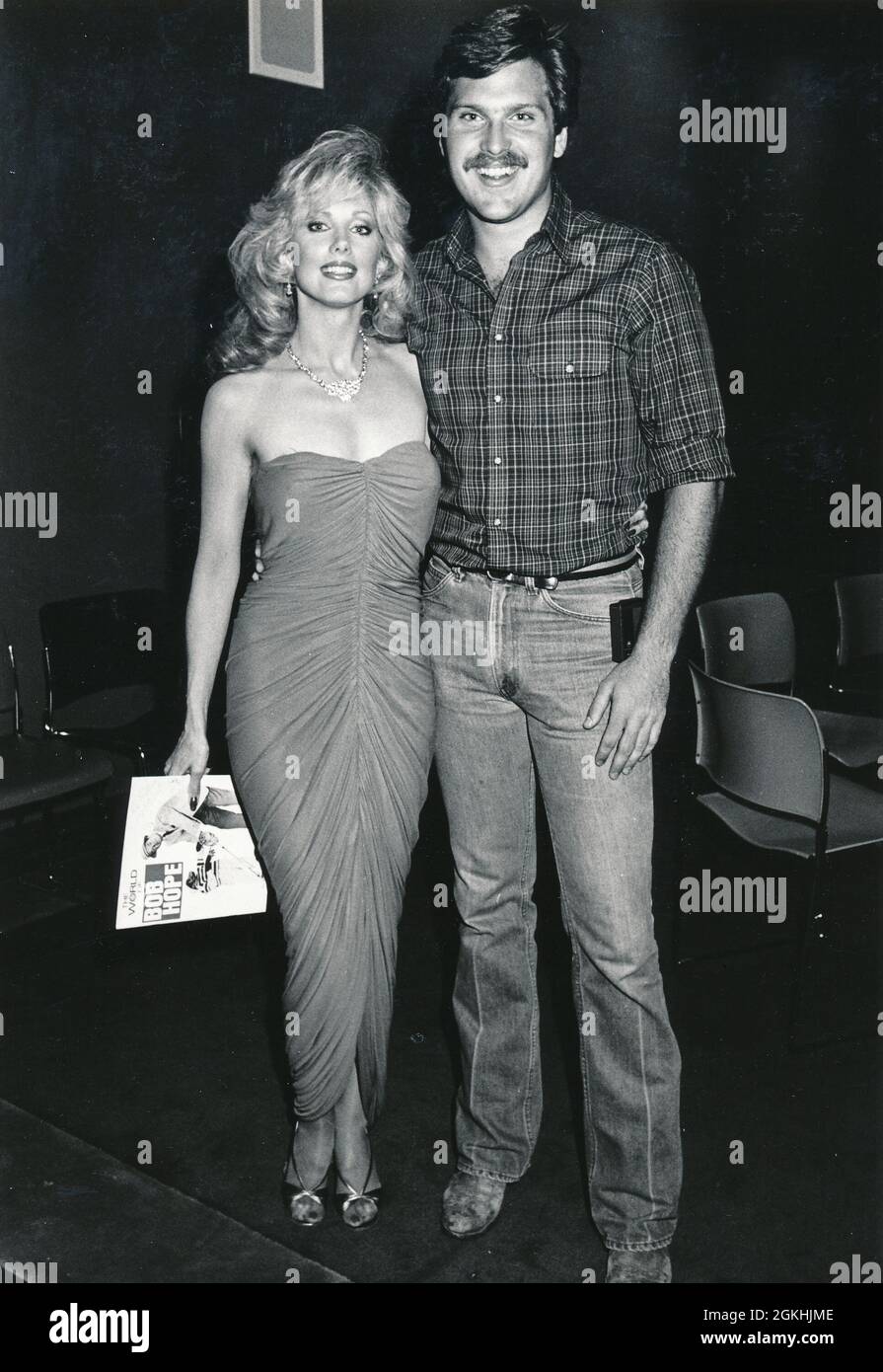 ©1985 Actress Morgan Fairchild posing with a fan in Austin, Texas Stock ...