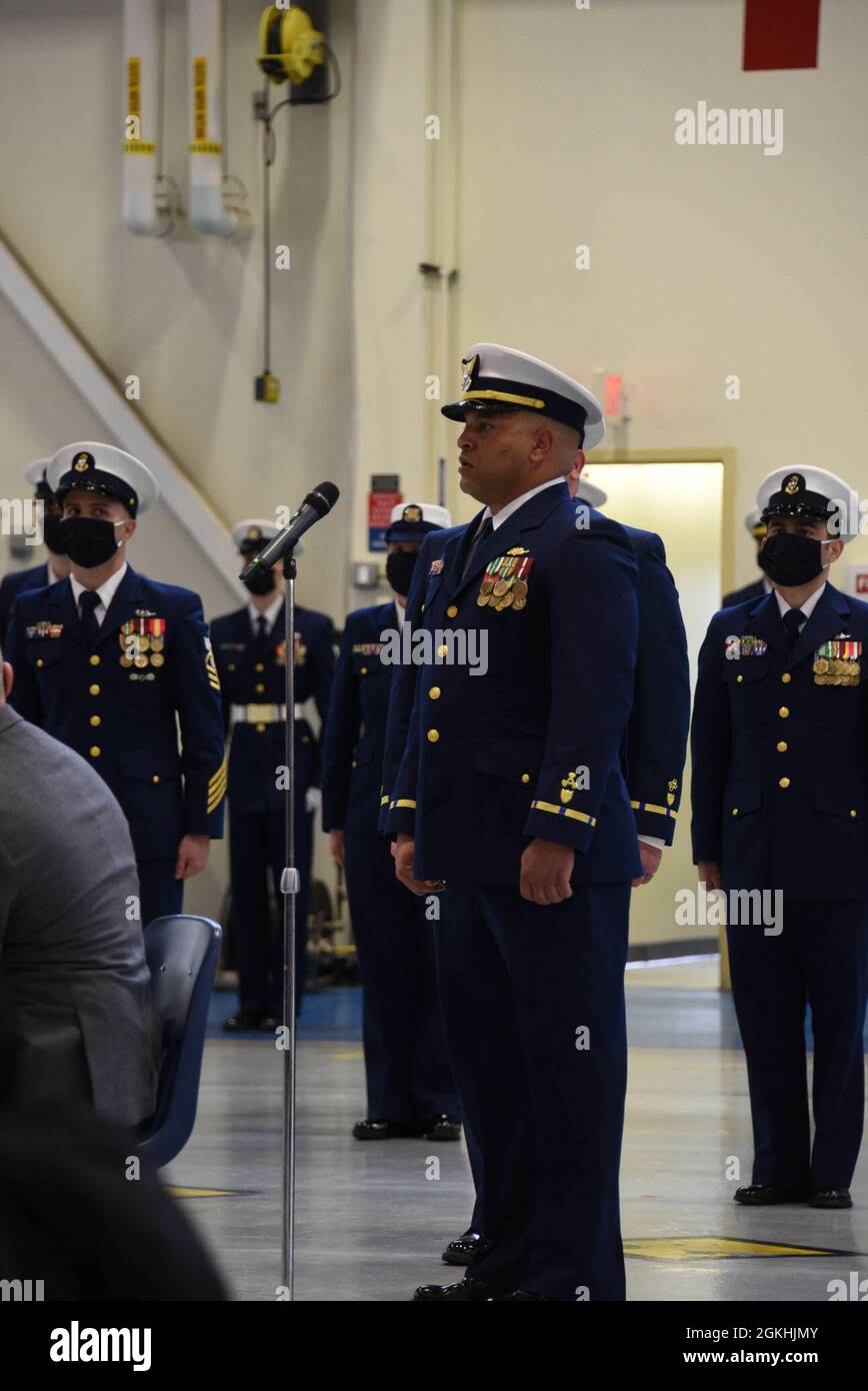 Member from Coast Guard Cutter Douglas Munro (WHEC 724) steps out of ...
