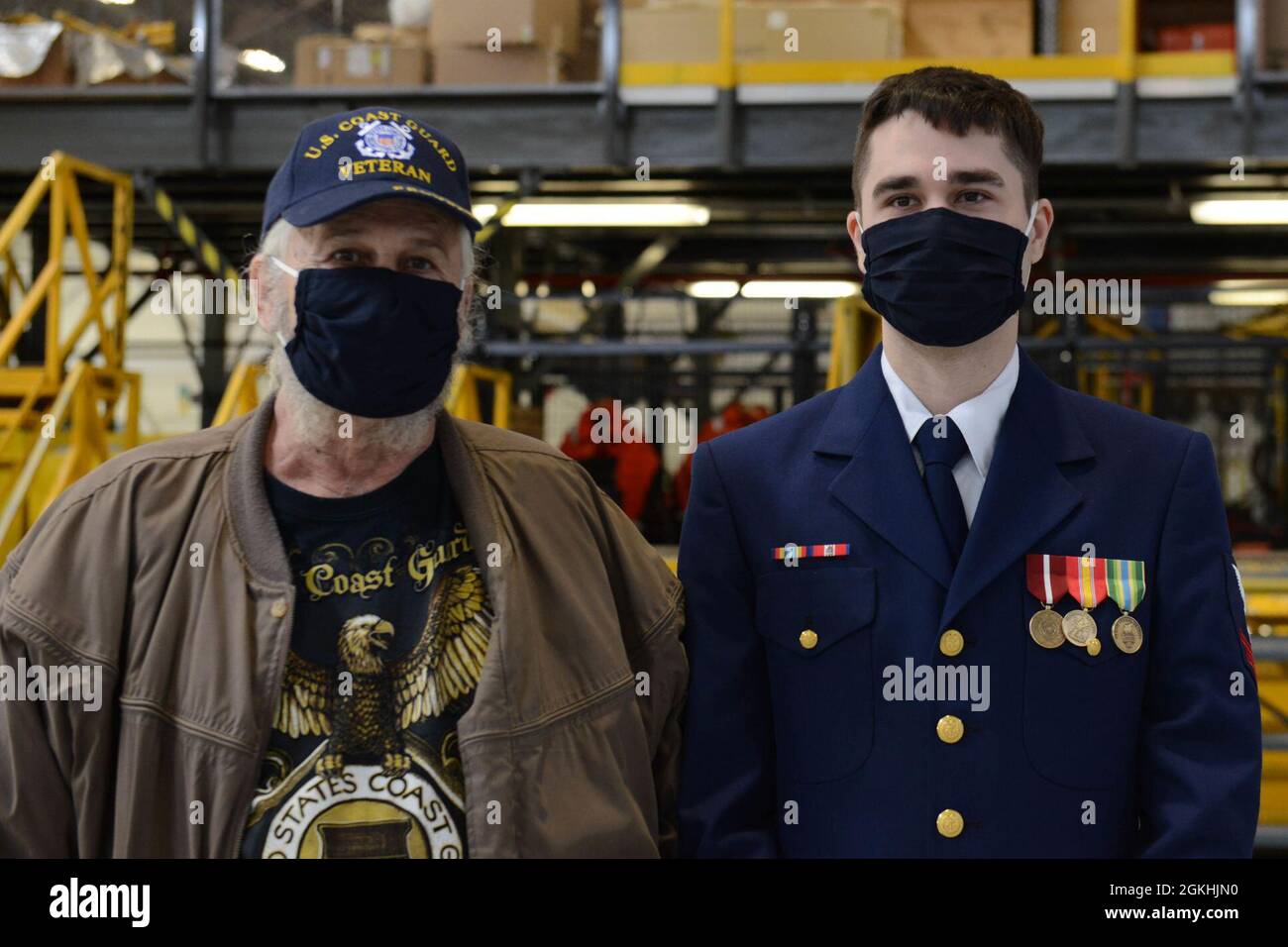 Jim Slappey (left) and his son Petty Officer 2nd Class Benjamin Slappey ...