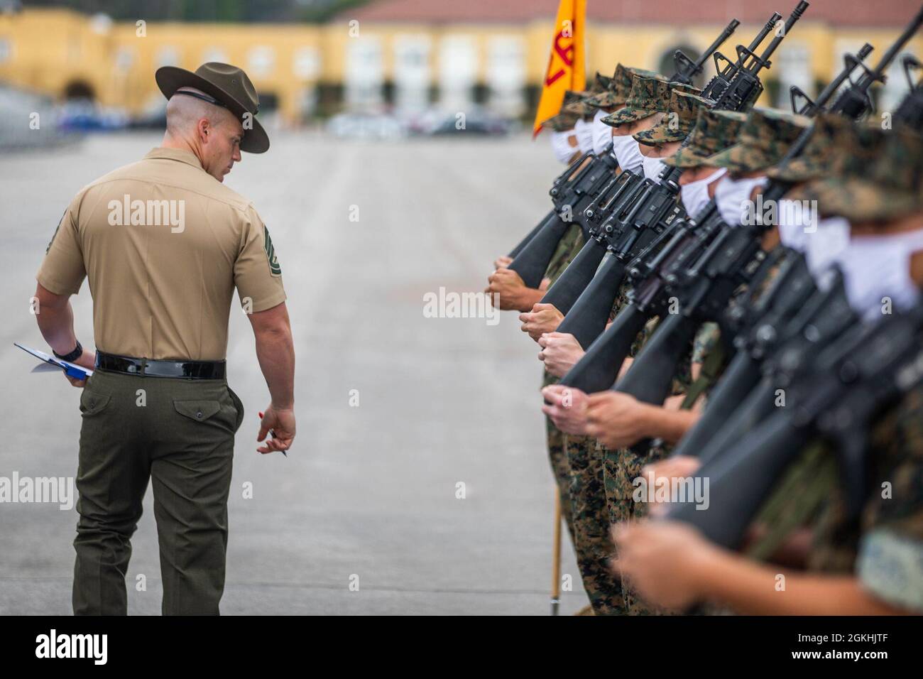 A drill master with the Recruit Training Regiment, inspects recruits ...