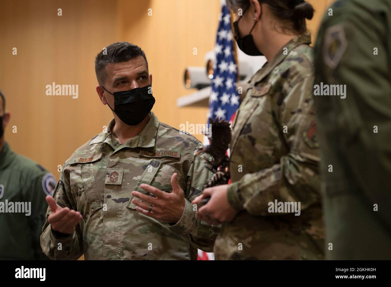 U.S. Air Force Chief Master Sgt. Michael E. Dixon, command chief, left ...