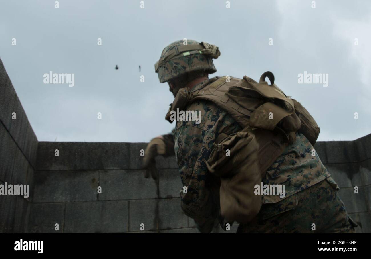 A U.S. Marine with 3d Landing Support Battalion, 3d Marine Logistics ...