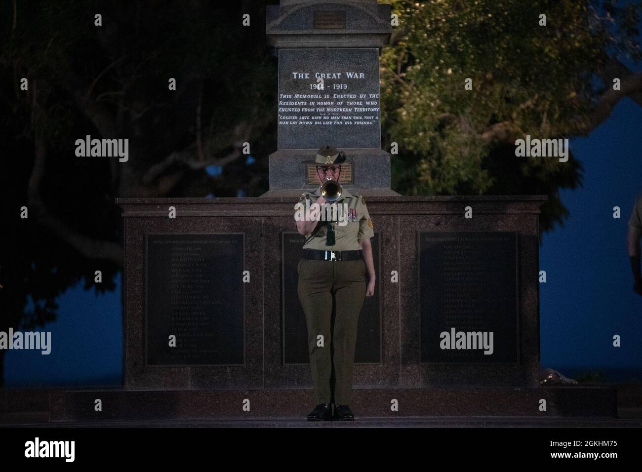An Australian Defence Force service member plays the bugle during an ...