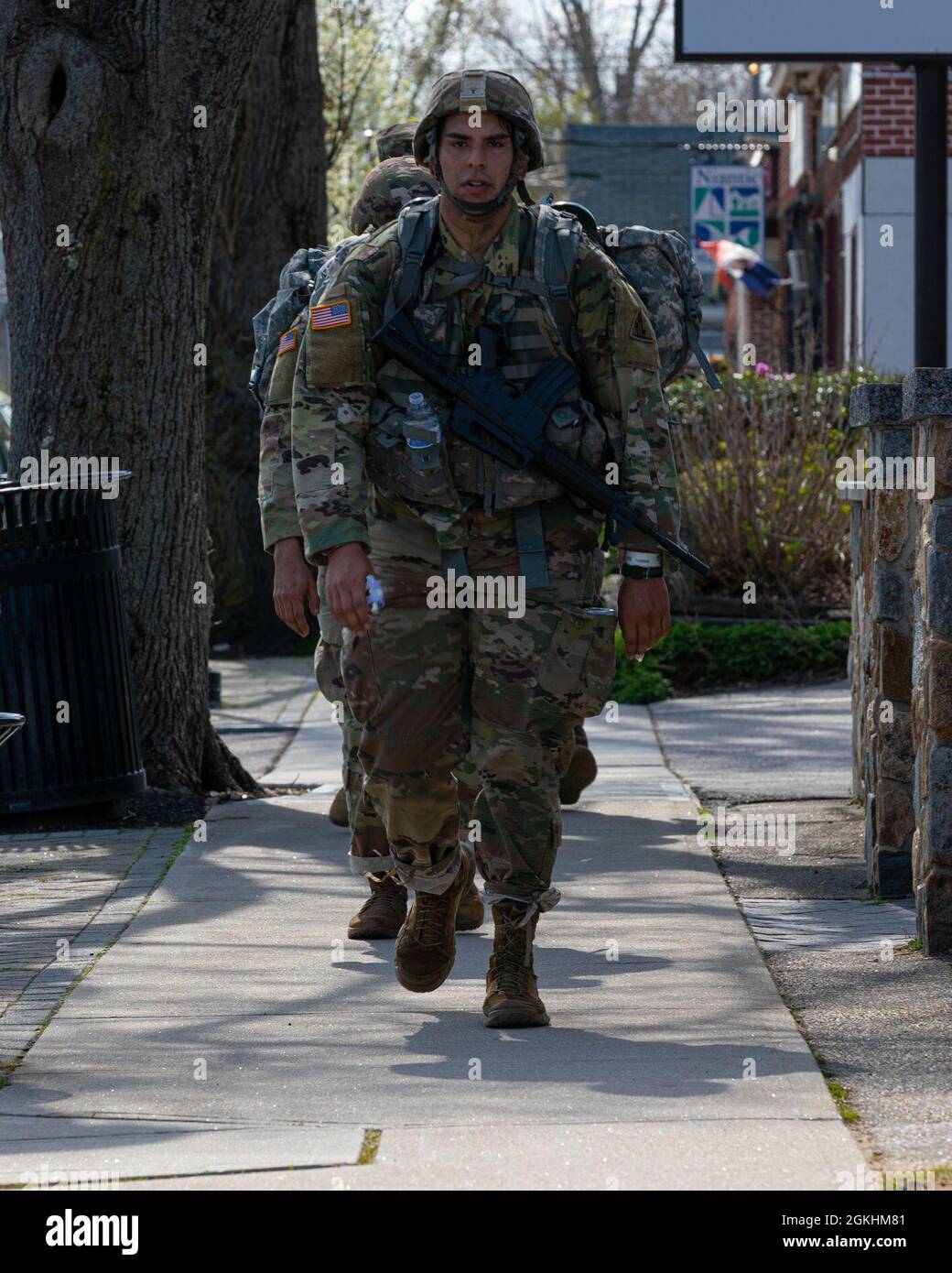 U.S. Army Sgt. Justin Wenzel, a Military Working Dog Handler assigned ...