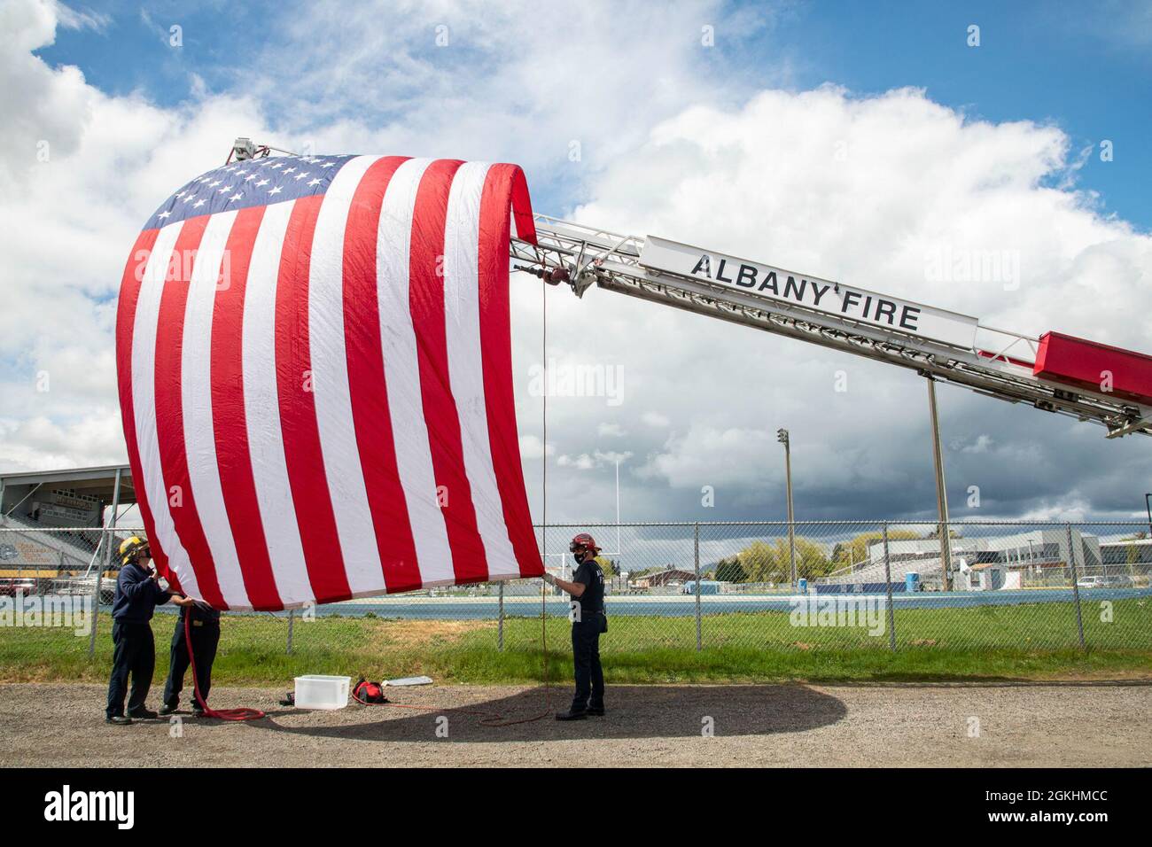 Firefighters from the Albany Fire department, Albany, Ore., outfit a ...