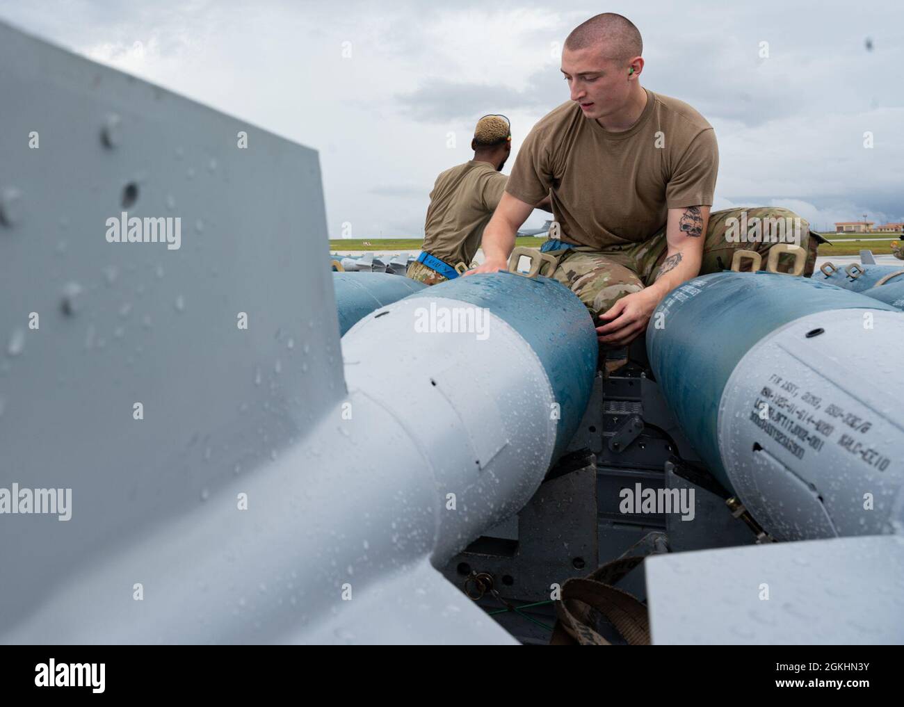 A U.S. Air Force Airman disconnects BDU-50 chronicle bombs and prepares ...