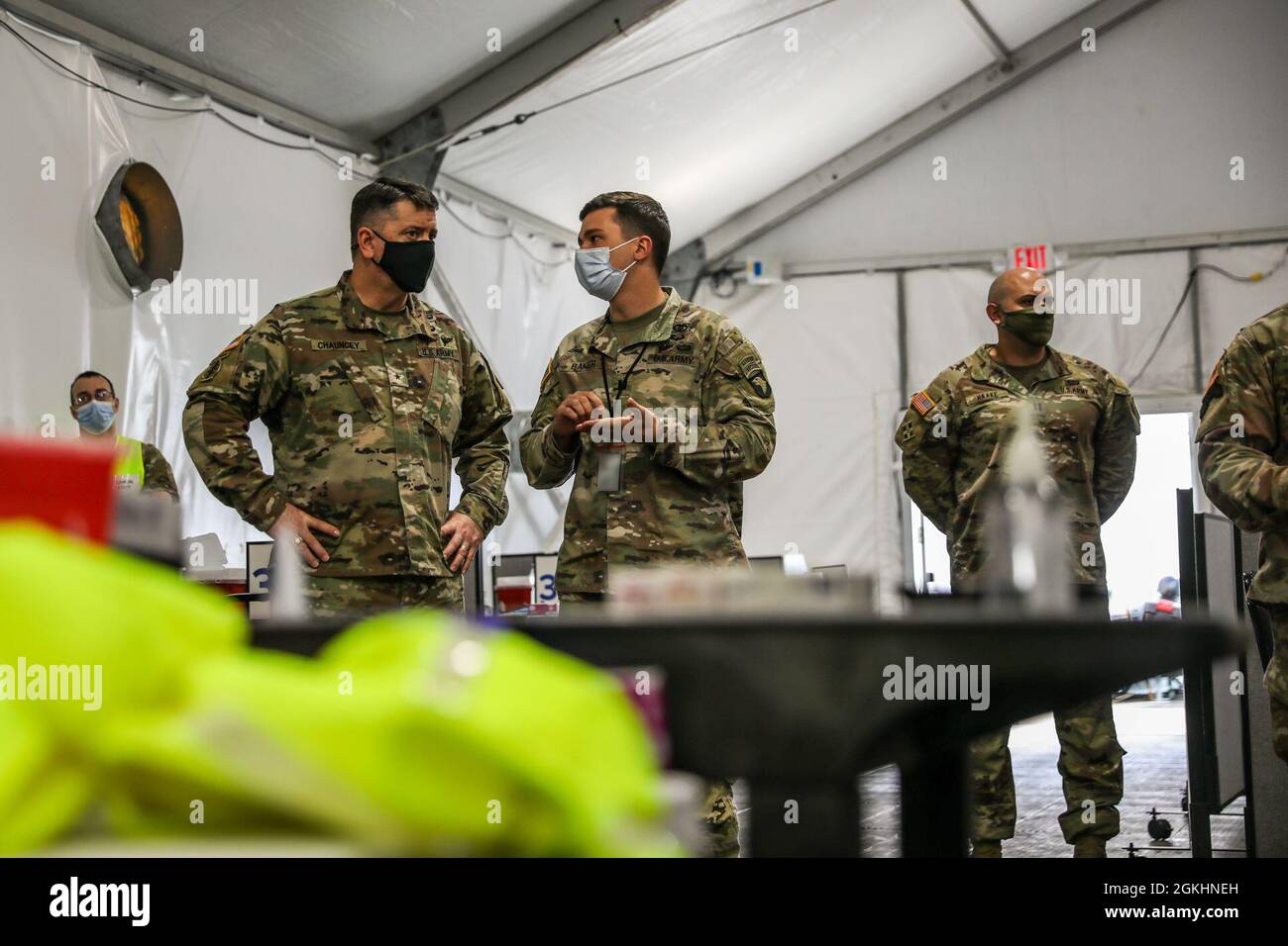 U.S. Army Capt. Chance Baker, right, Commander of Charlie Company ...