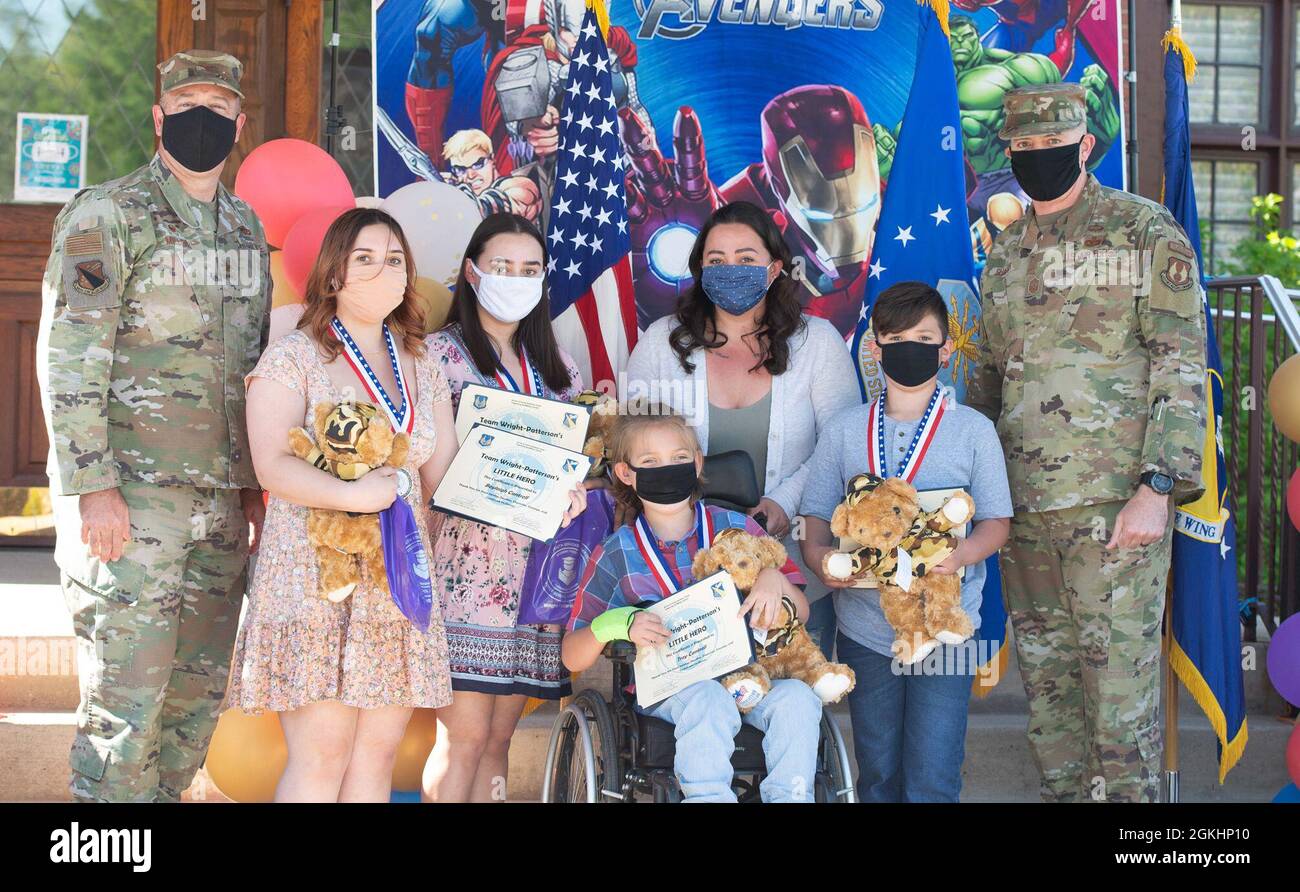 U.S. Air Force Col. Patrick Miller, 88th Air Base Wing commander, left ...