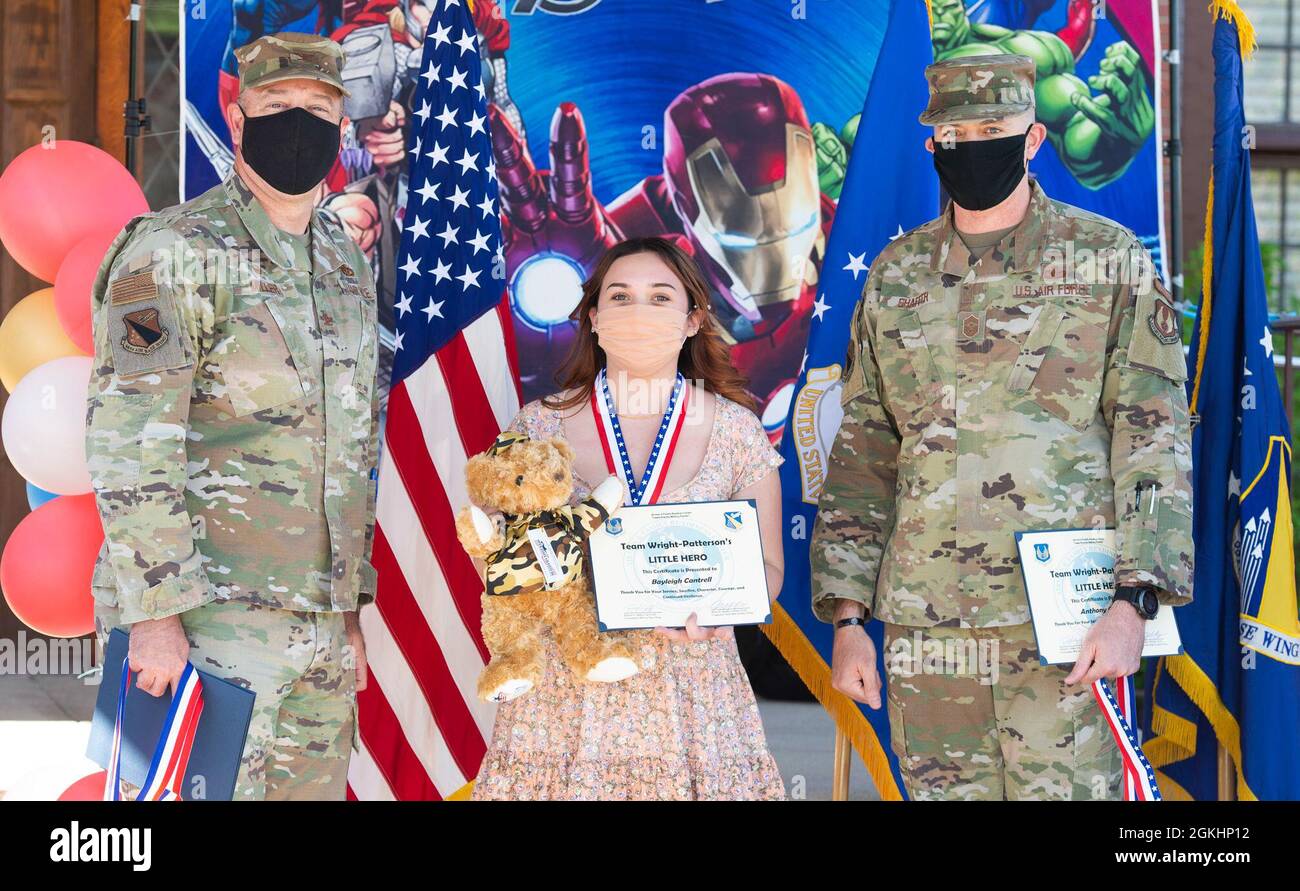 U.S. Air Force Col. Patrick Miller, 88th Air Base Wing commander, left ...