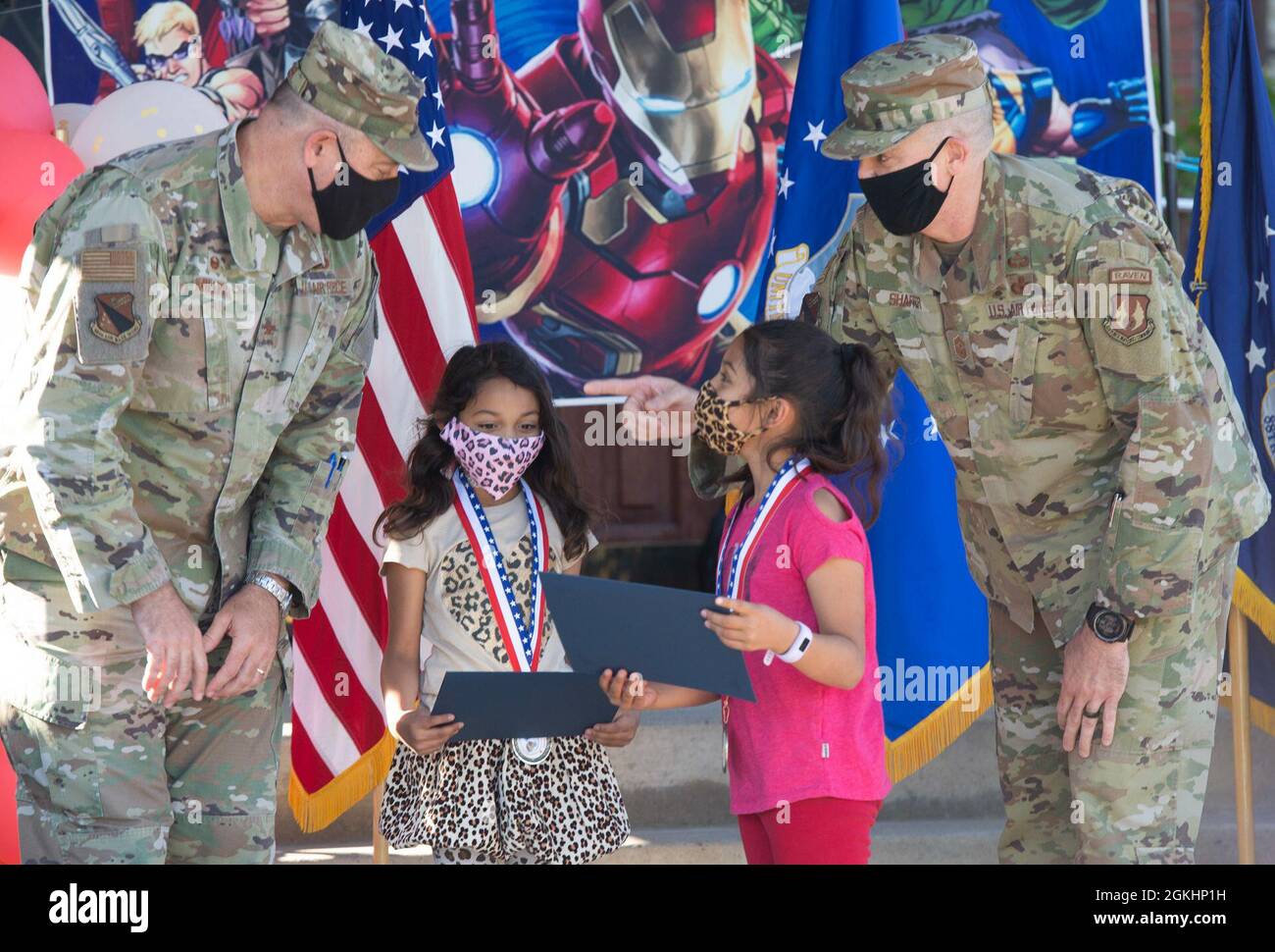 U.S. Air Force Col. Patrick Miller, 88th Air Base Wing commander, left ...