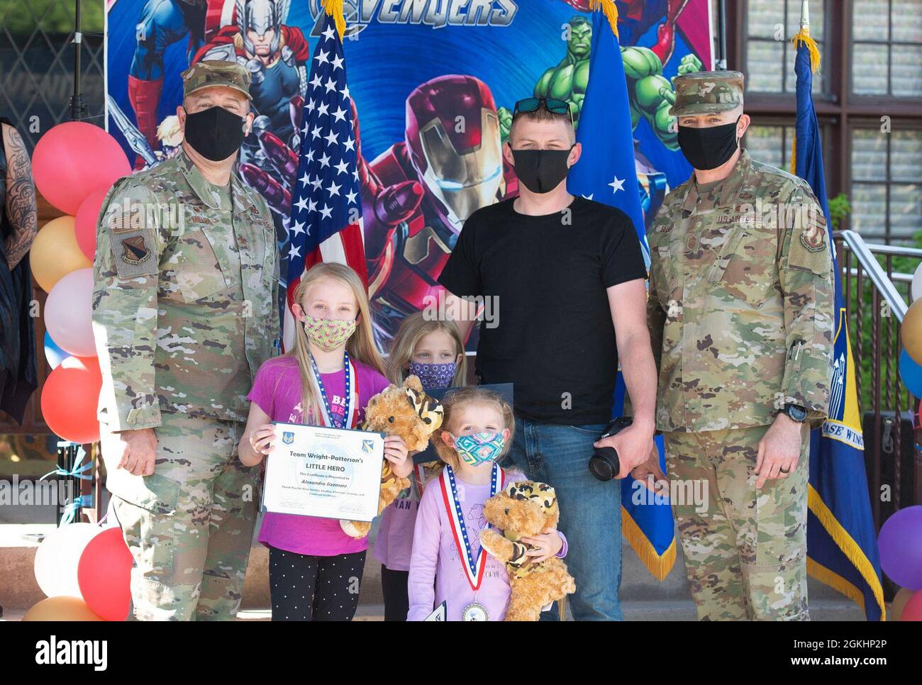 U.S. Air Force Col. Patrick Miller, 88th Air Base Wing commander, left ...