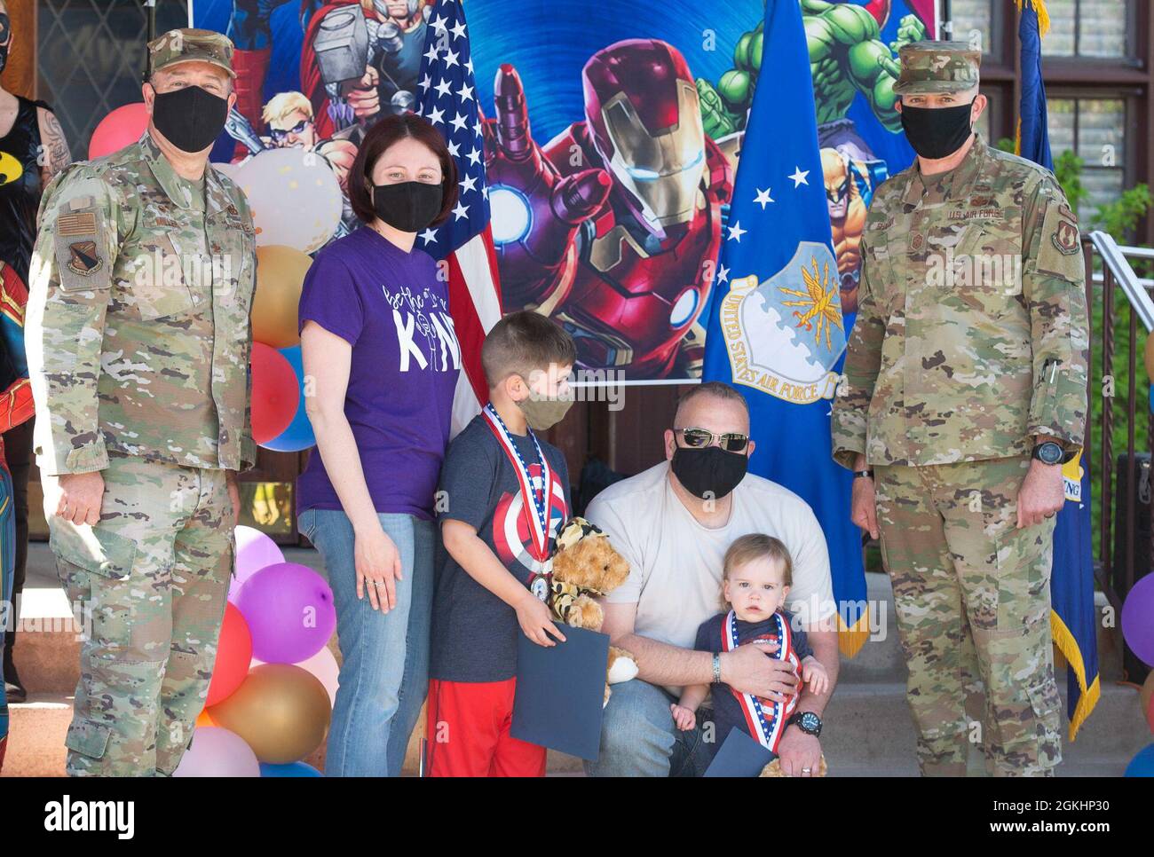 U.S. Air Force Col. Patrick Miller, 88th Air Base Wing commander, left ...