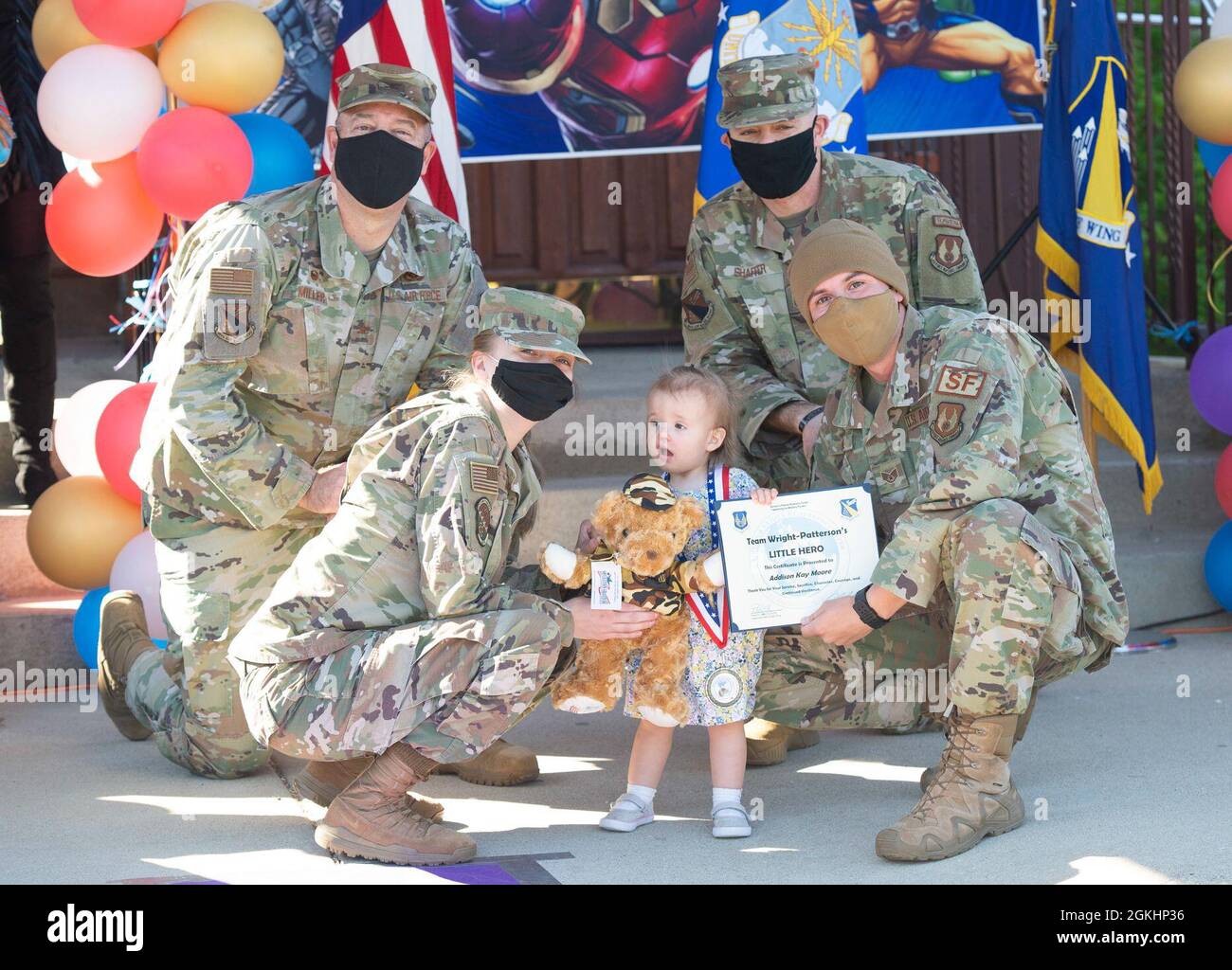 U.S. Air Force Col. Patrick Miller, 88th Air Base Wing commander, left ...