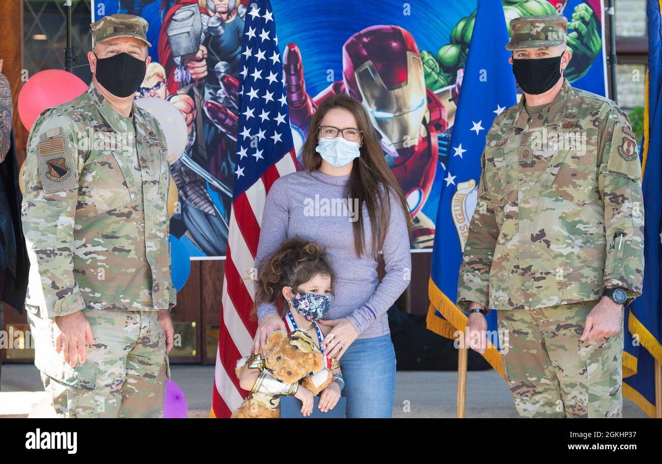 U.S. Air Force Col. Patrick Miller, 88th Air Base Wing commander, left ...