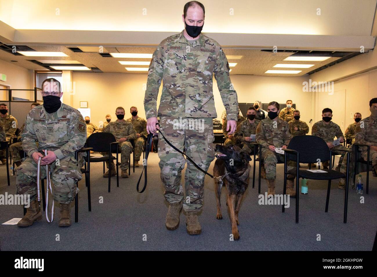 U.S. Air Force Tech. Sgt. Lance Brennan, a military working dog handler ...