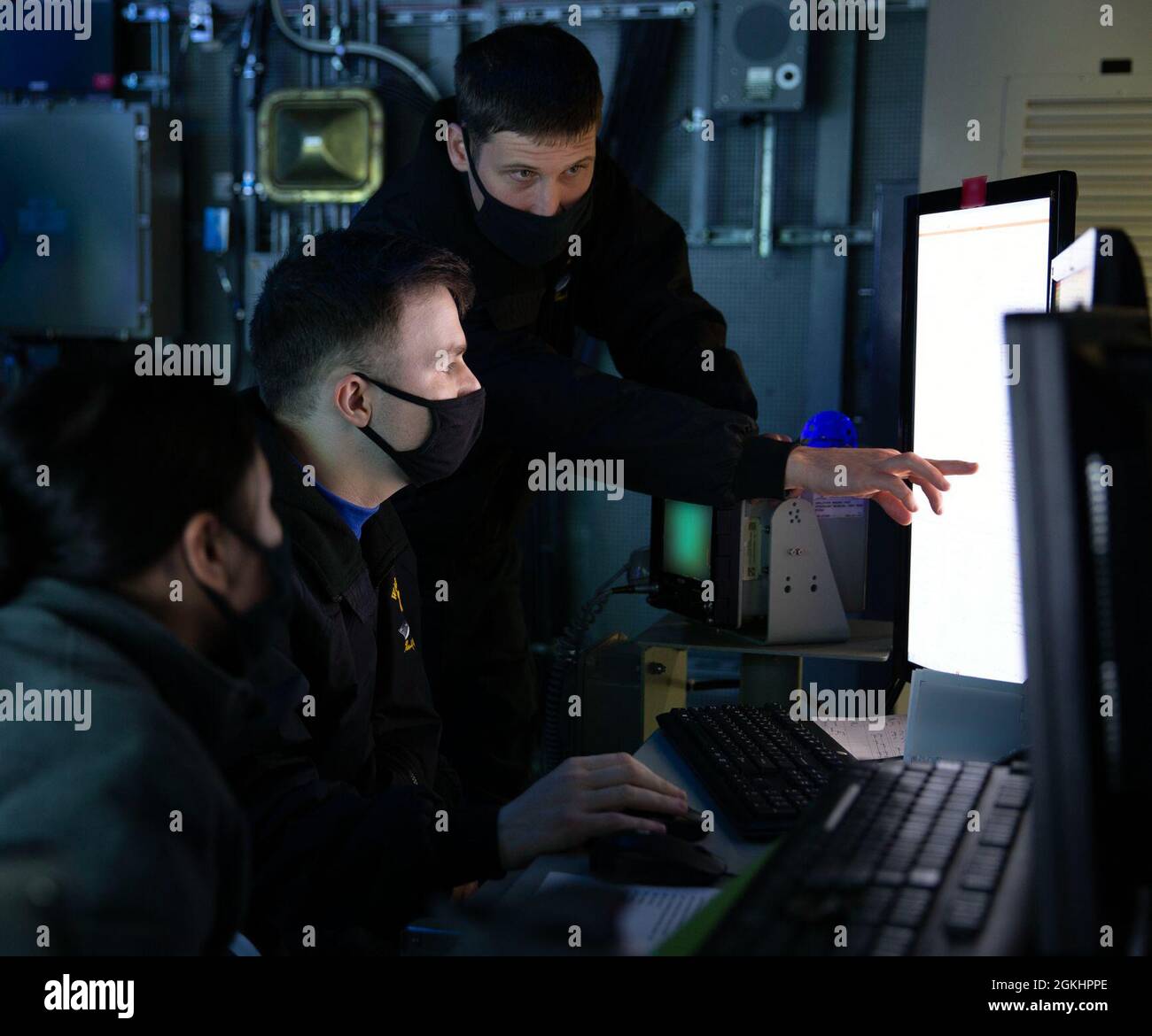 Operations Specialist 1st Class Shane Pfeffer, right, from Bryan, Texas ...