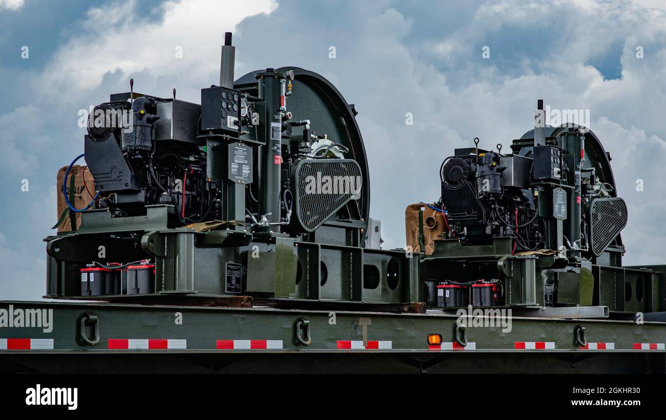 Two Barrier Arresting Kits sit on a trailer on the flight line at ...