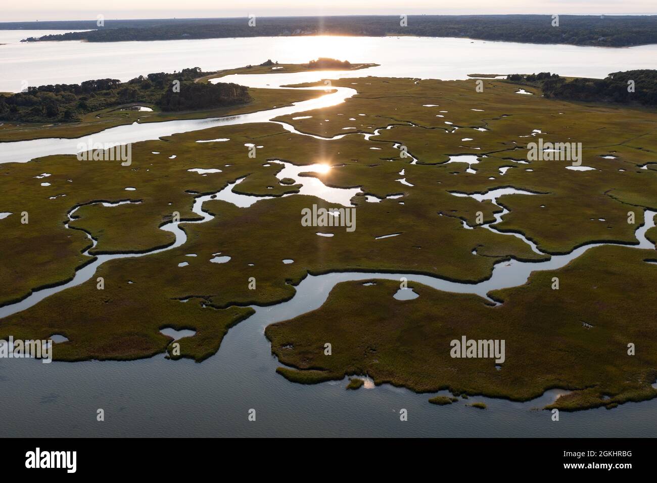 Channels meander through a salt marsh in Pleasant Bay, Cape Cod ...
