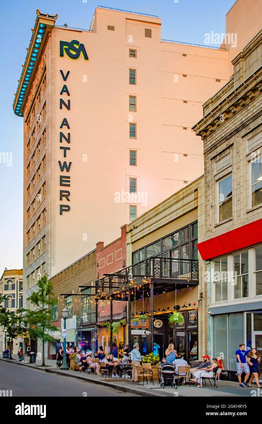 Customers eat at Dauphin Street restaurants near the Van Antwerp ...