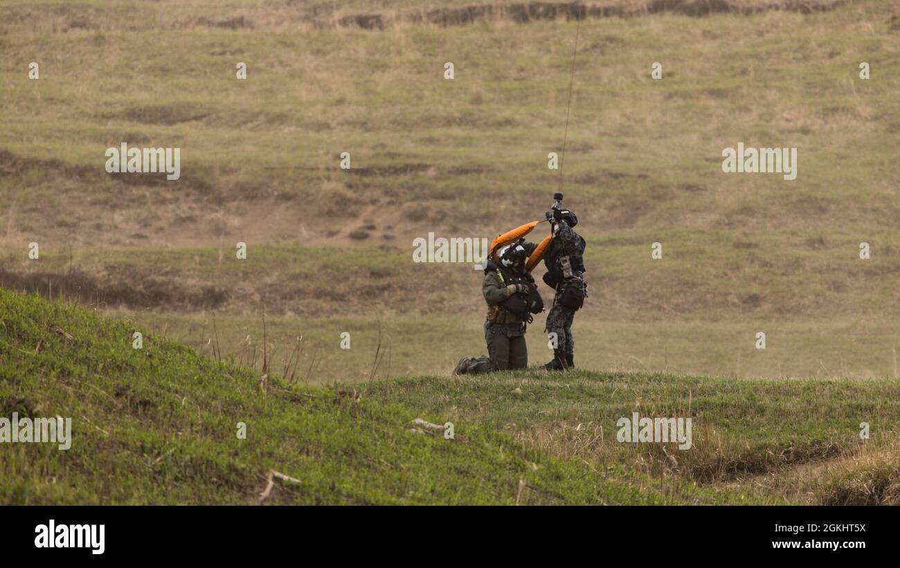 Japan Air Self-Defense Force Pararescuemen with Ashiya Air Rescue ...