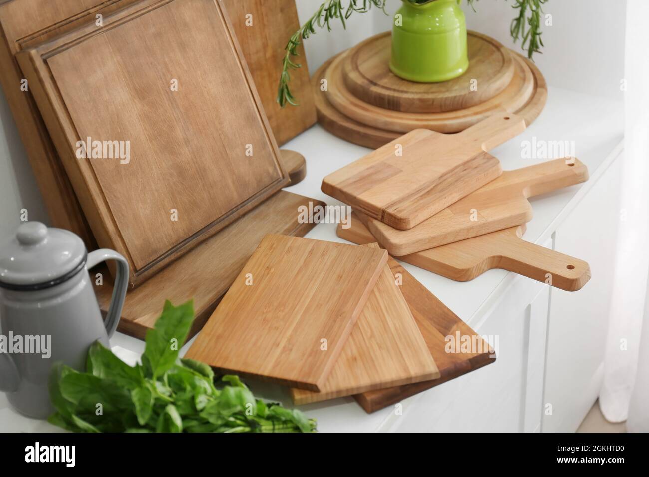 Different wooden boards in kitchen Stock Photo - Alamy