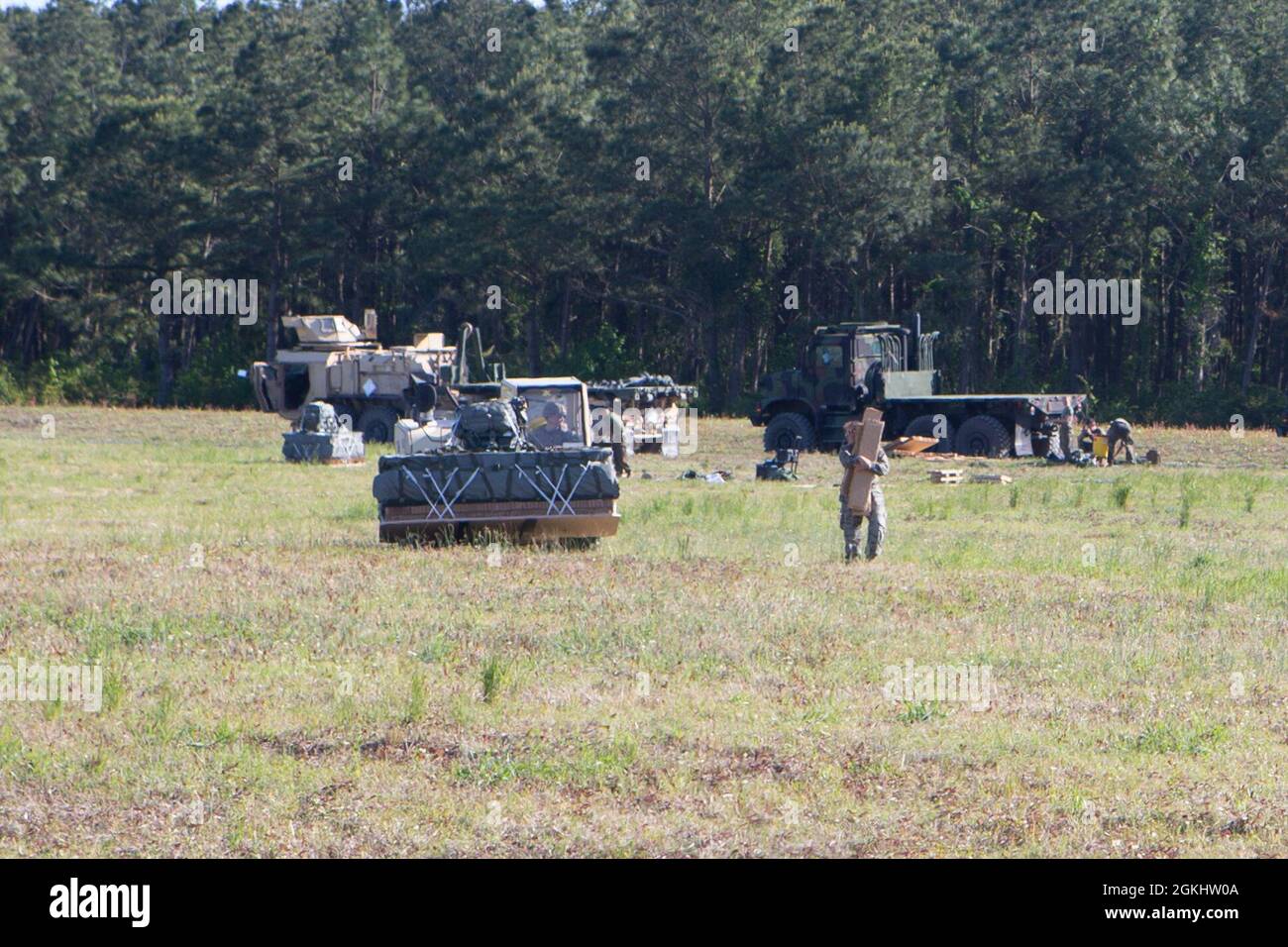 U.S. Marines with 2nd Landing Support Battalion (LSB) prepare to load a ...
