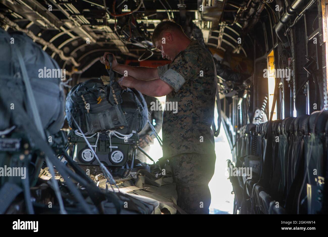 U.S. Marine Corps Staff Sgt. Marvin Loverkamp secures a Joint Precision ...