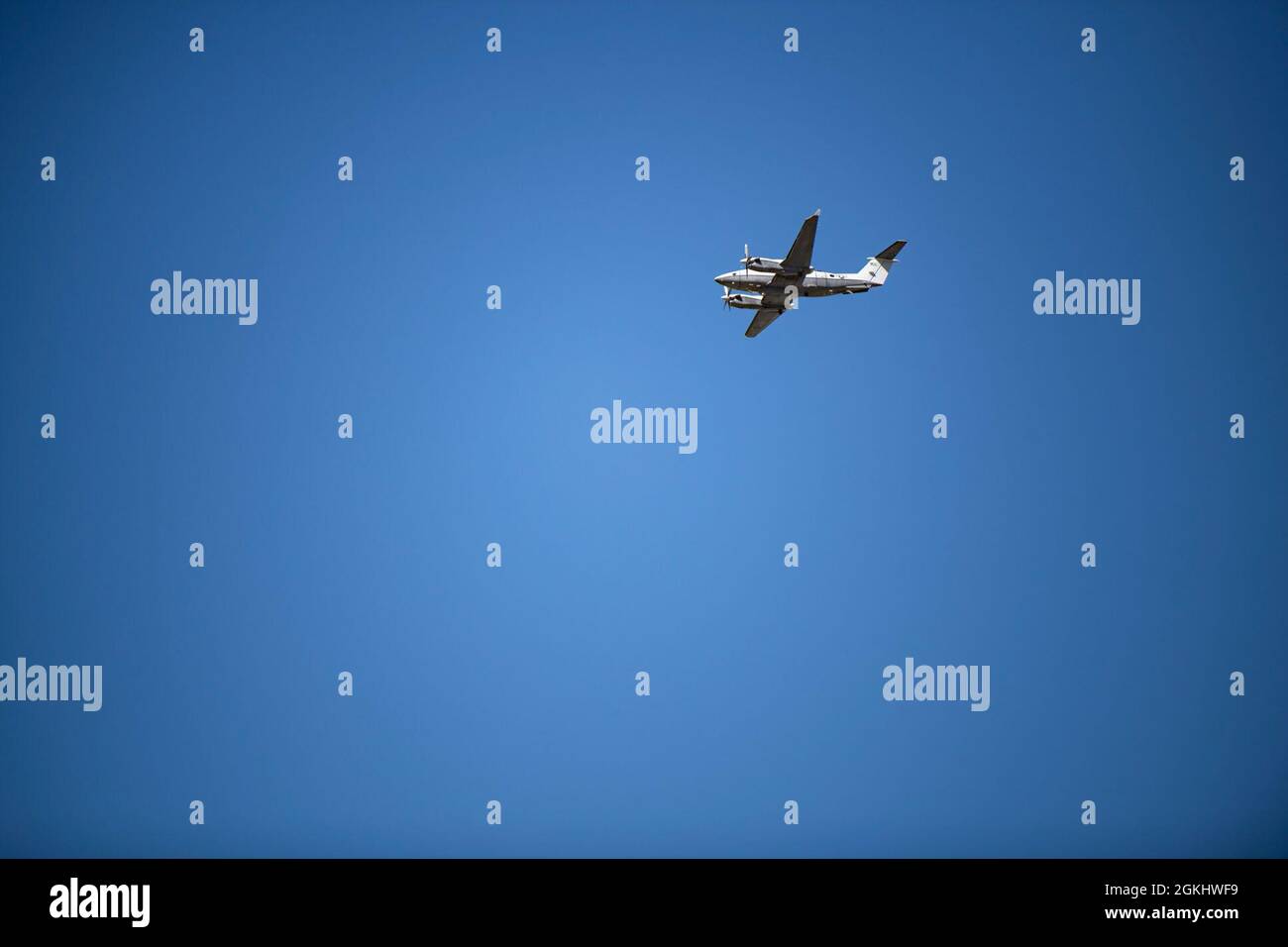 An MC-12 flies over the INDY 08 memorial ceremony at Beale Air Force ...